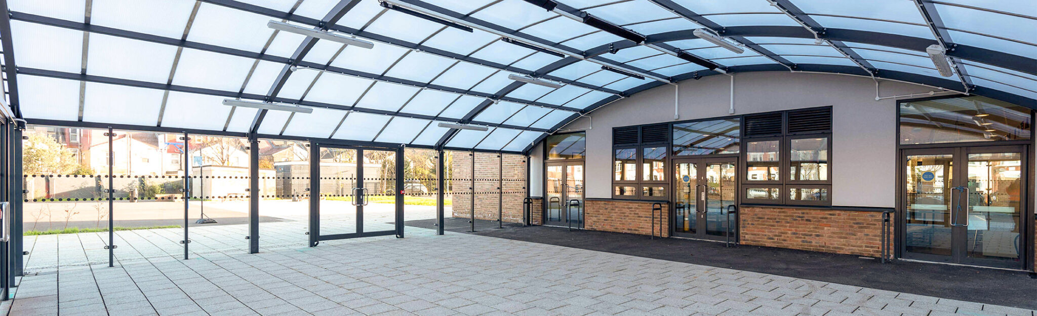 Why Choose an Enclosed Canopy for Your School? - Structures